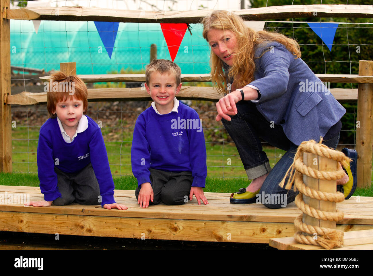 Actress Geraldine Jones with primary school pupils at opening of new ...