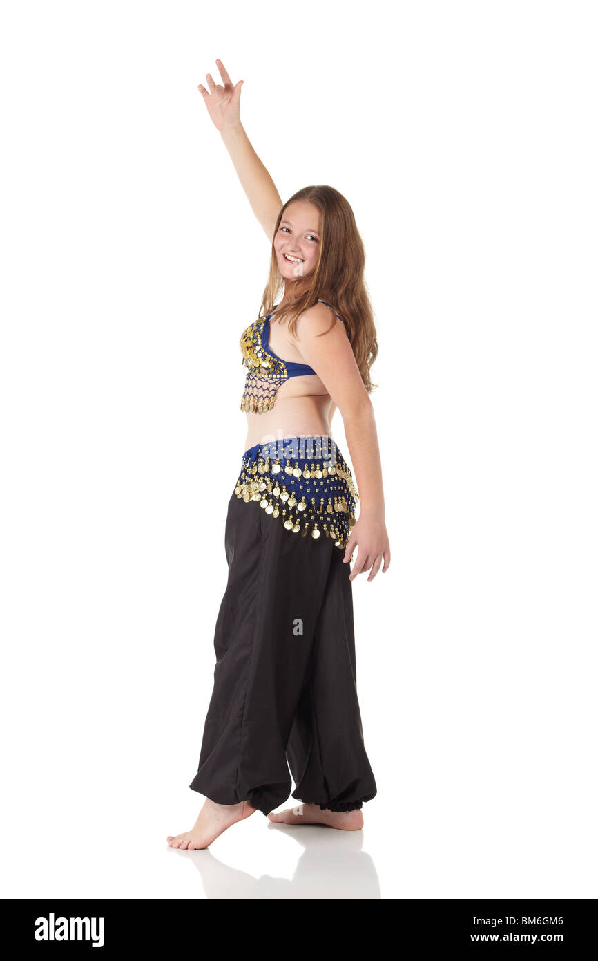 Young Caucasian belly dancing girl in beautiful decorated clothes on ...