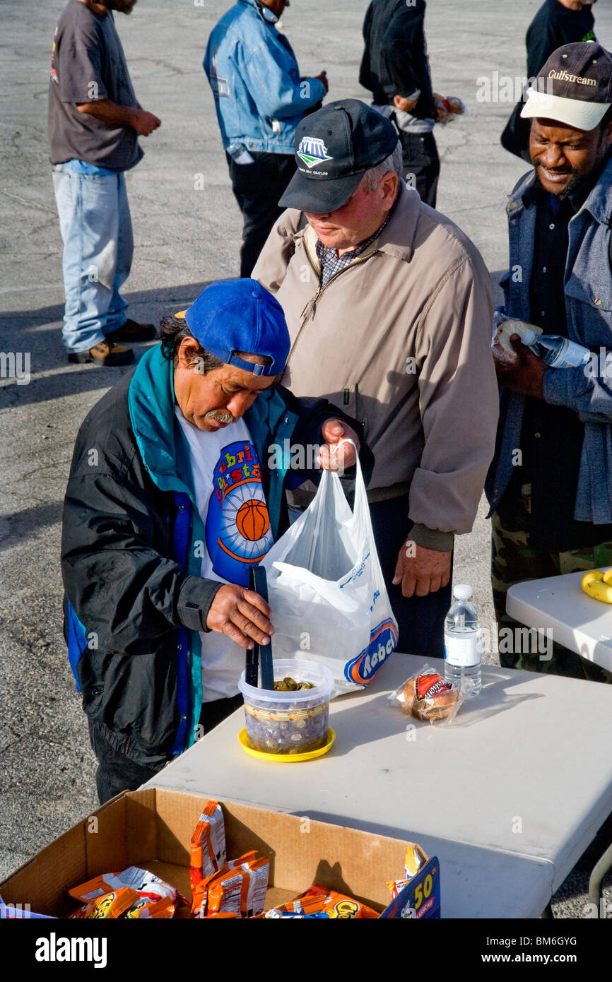 Homeless food line hi-res stock photography and images - Alamy