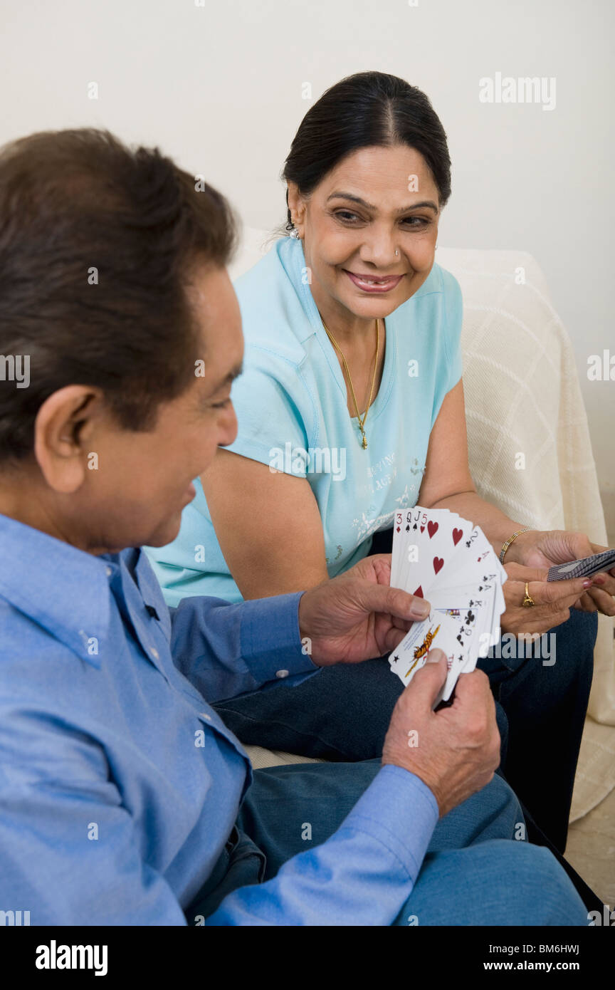 Couple playing cards Stock Photo - Alamy