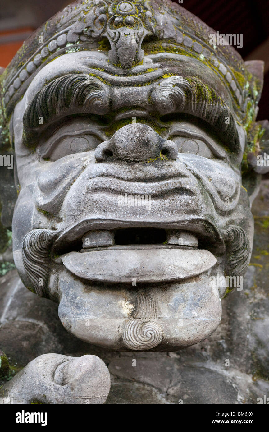 Demon statue at a temple garden in Bali, Indonesia Stock Photo - Alamy