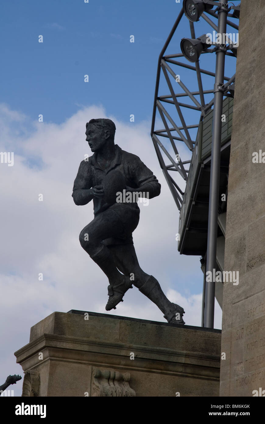 Statue of a rugby player outside Twickenham rugby ground Twickenham ...