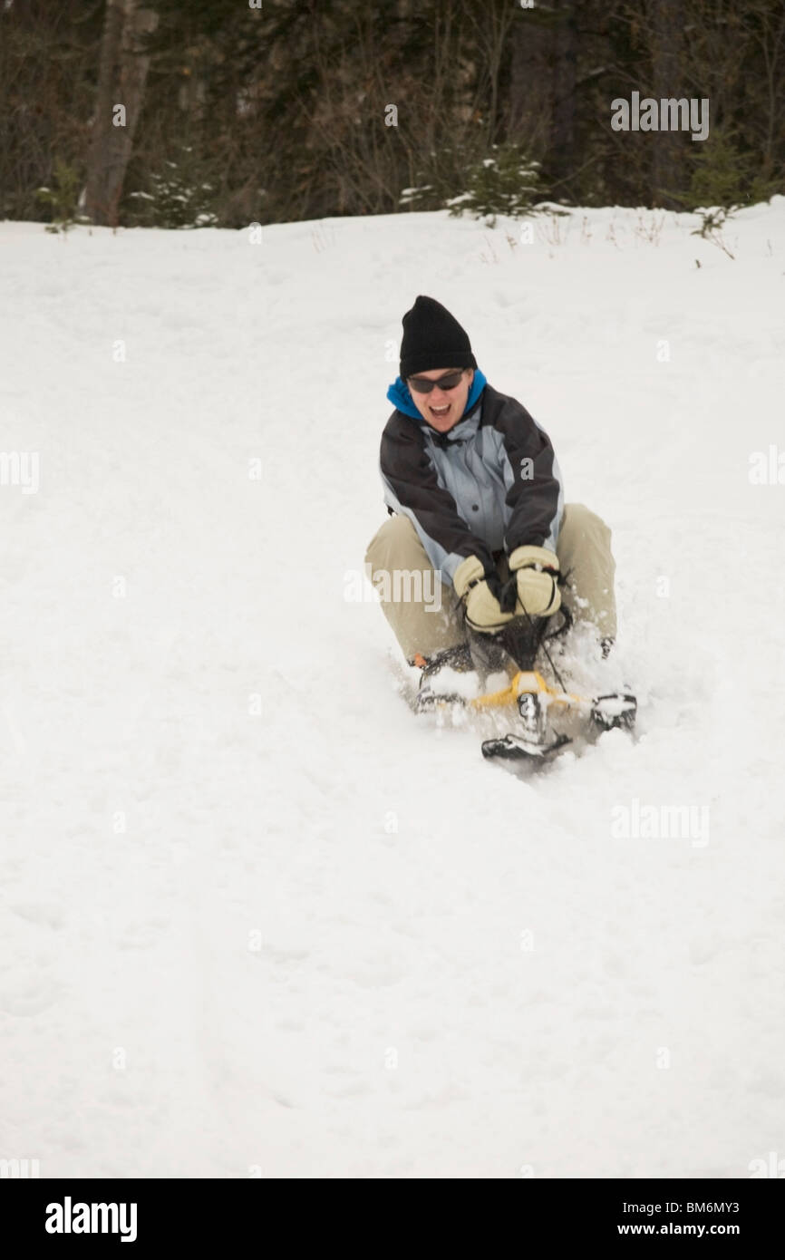 Person sleds down hill hi-res stock photography and images - Alamy