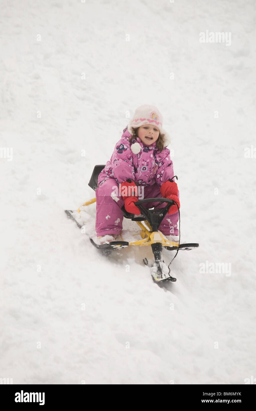 Children sledding down hill having hi-res stock photography and images ...