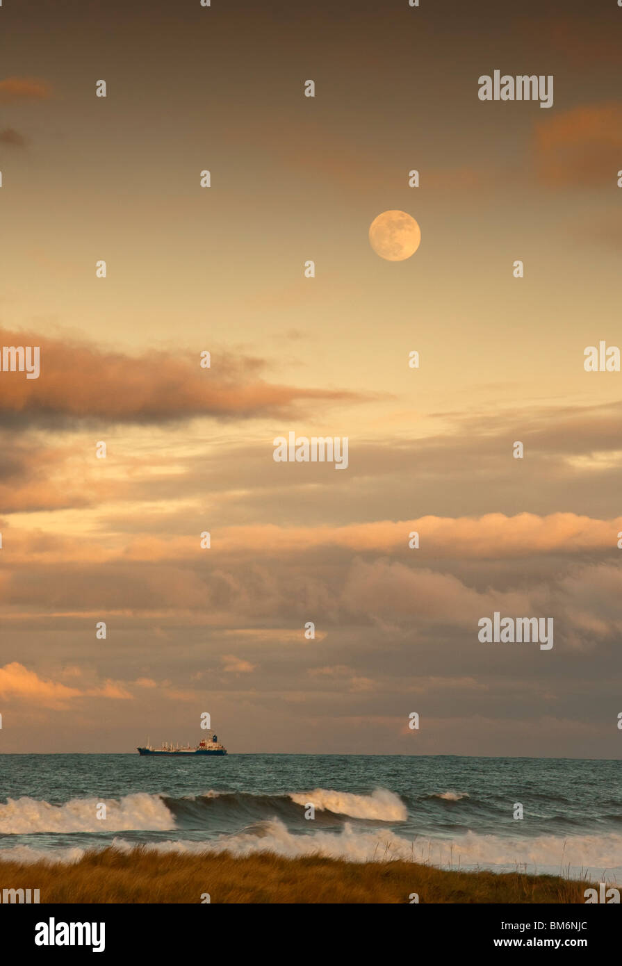 Cargo ship at sea with moon hi-res stock photography and images - Alamy