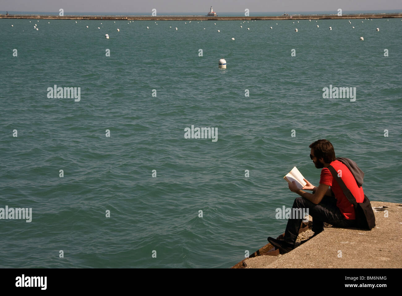 Man on shore of lake hi-res stock photography and images - Alamy