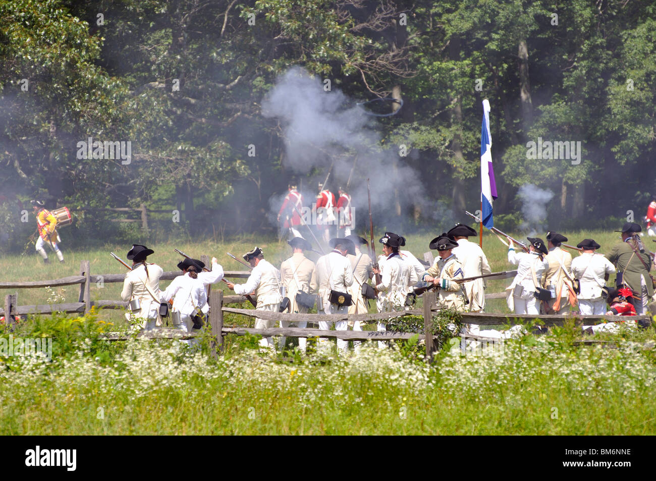 American patriots in battle - costumed American Revolutionary War era ...