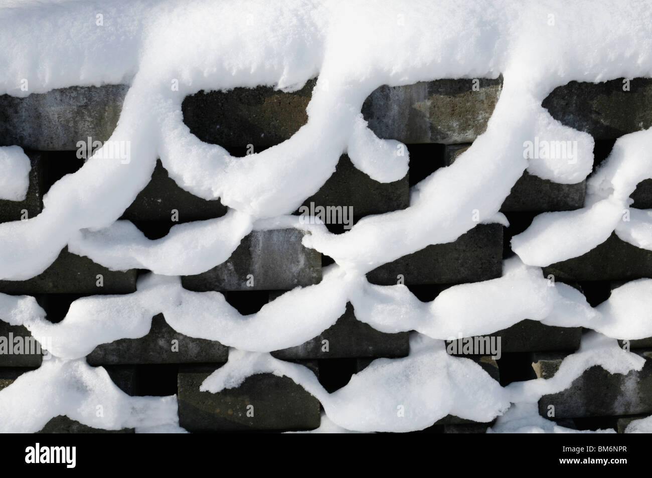 Snow On Concrete Bricks Stock Photo - Alamy