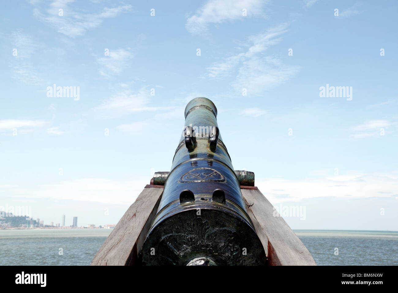 An image of a vintage colonial canon aiming towards the sea Stock Photo ...