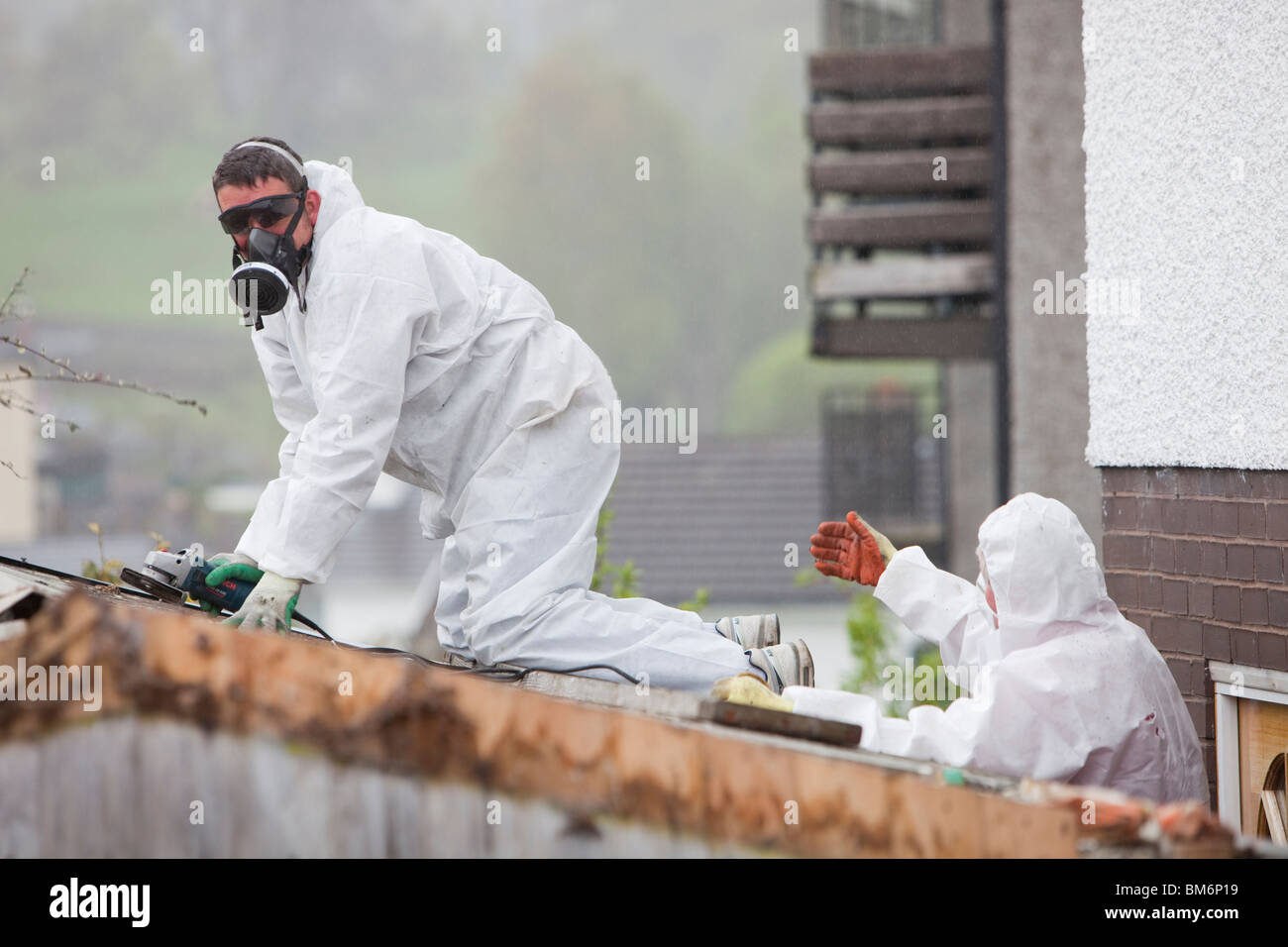 Removing asbestos from roof hi-res stock photography and images - Alamy