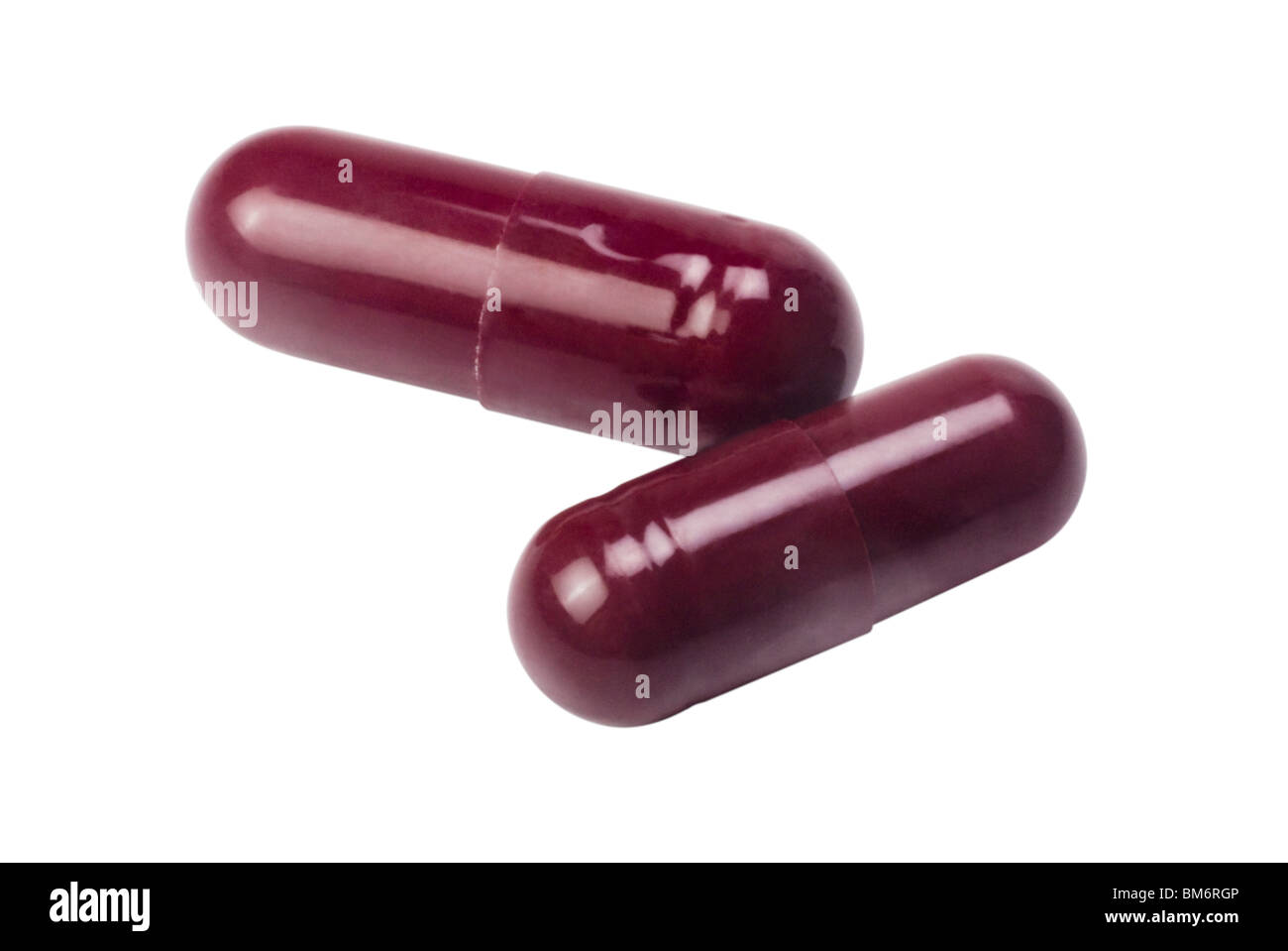 Close-up of two capsules Stock Photo - Alamy
