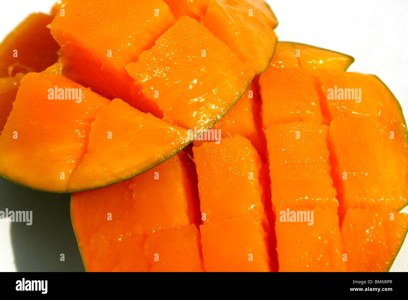 Mango slices and cubes isolated Stock Photo - Alamy
