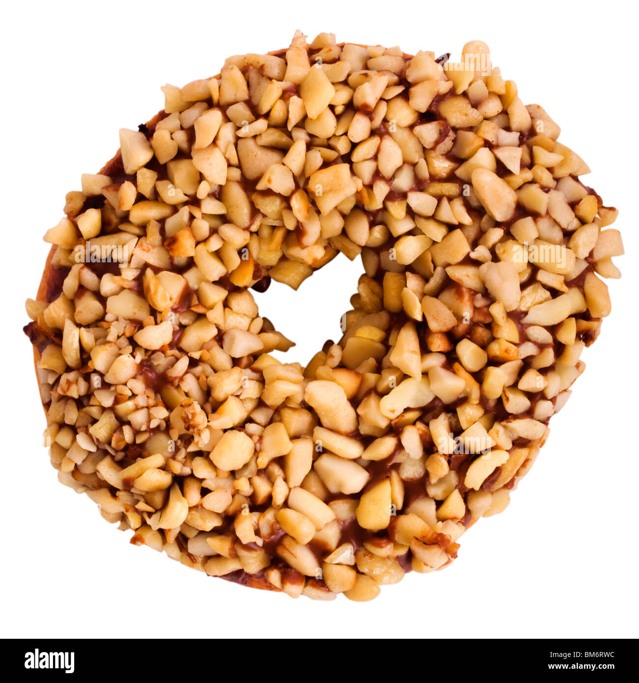Close-up of a donut garnished with nuts Stock Photo - Alamy