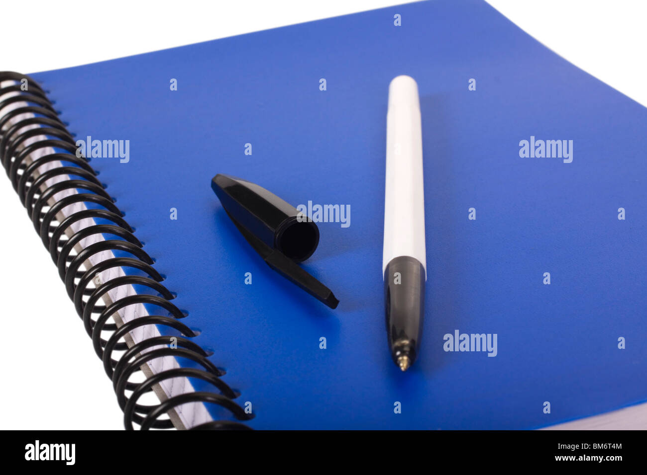 Close-up of a ballpoint pen on a spiral notebook Stock Photo - Alamy