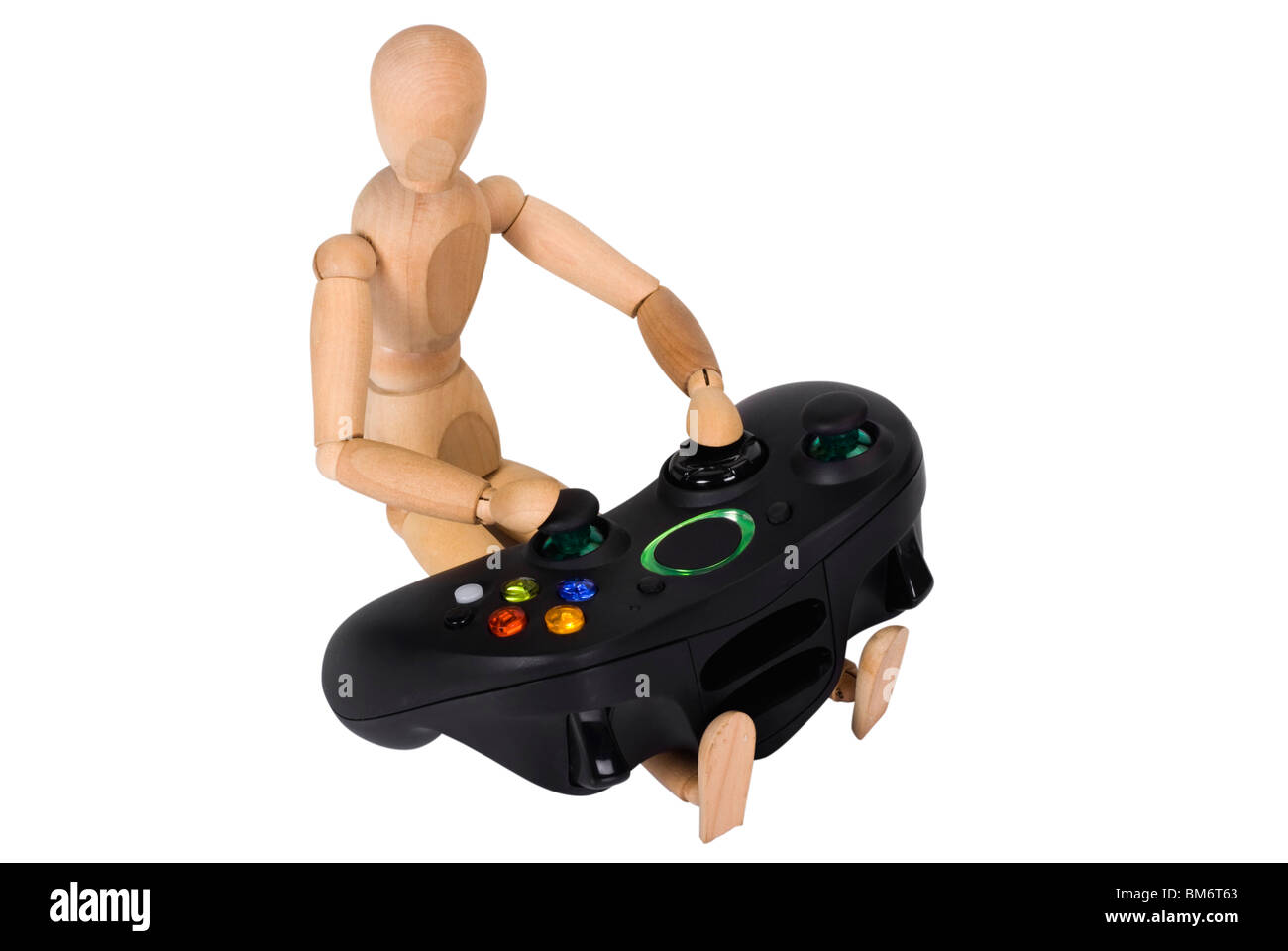 Artist's figure with a video game controller Stock Photo - Alamy