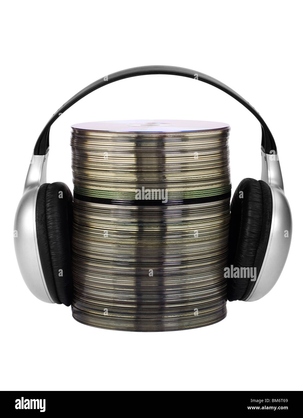 Stack of compact discs with headphones Stock Photo - Alamy
