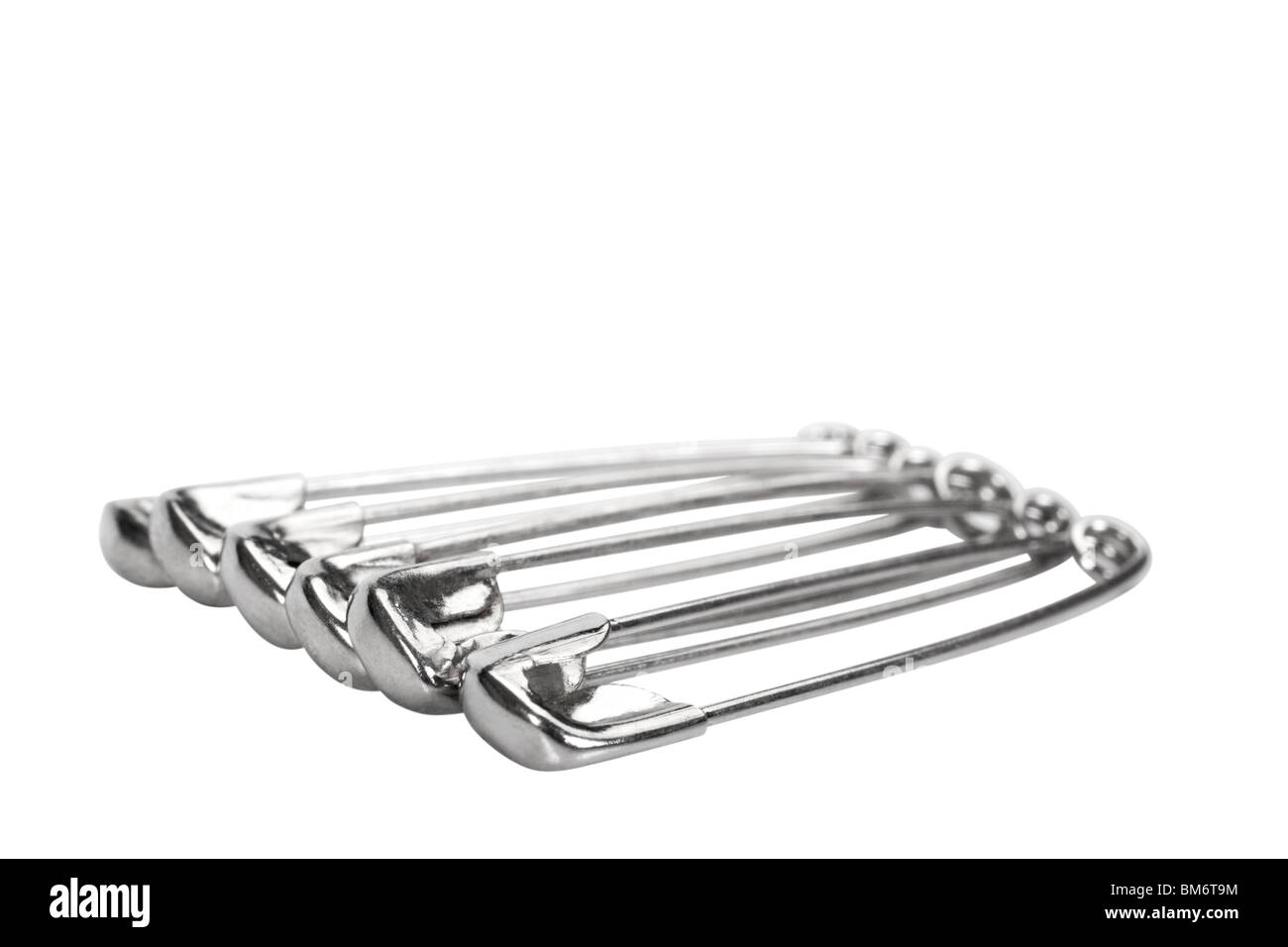 Row of safety pins hi-res stock photography and images - Alamy