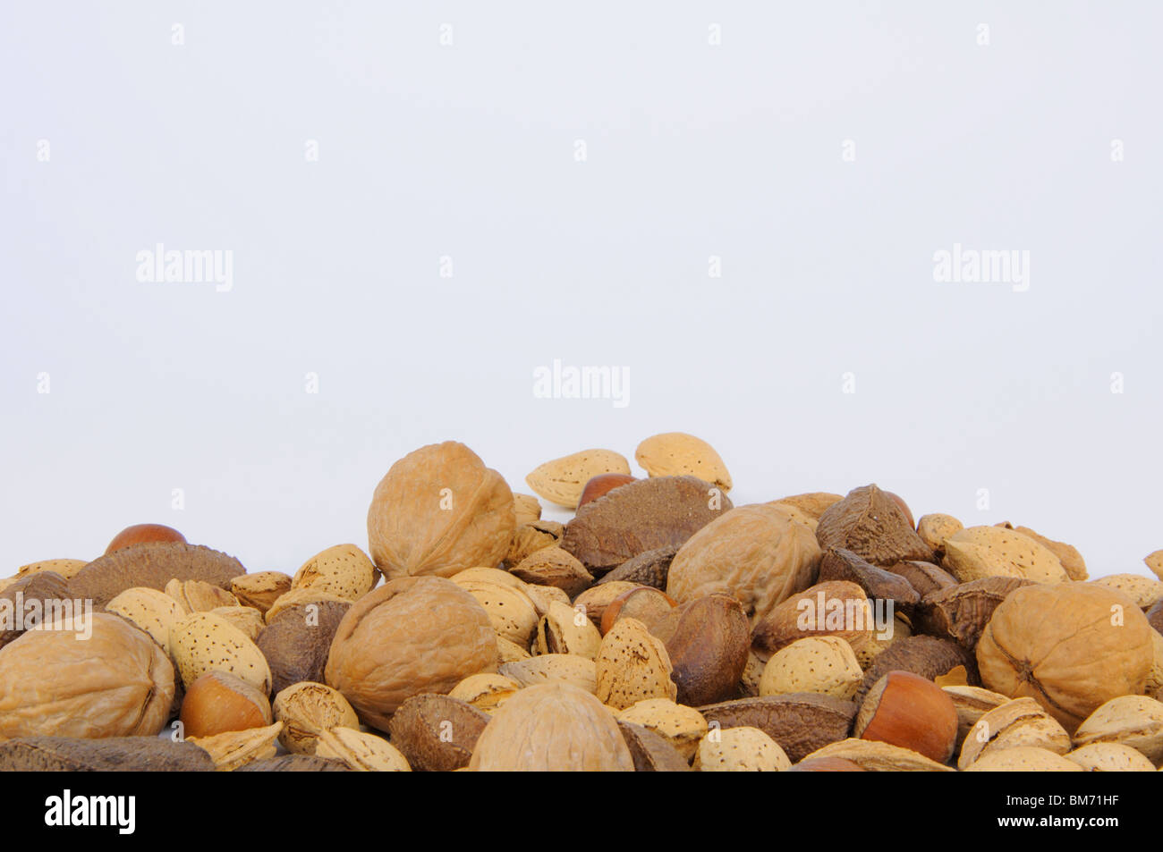 Mixed nuts in shells Stock Photo - Alamy