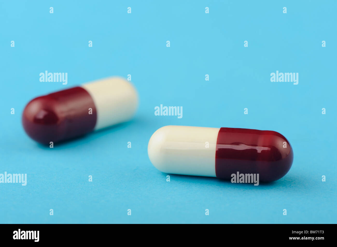 set capsules on blue background. Photo closeup Stock Photo - Alamy