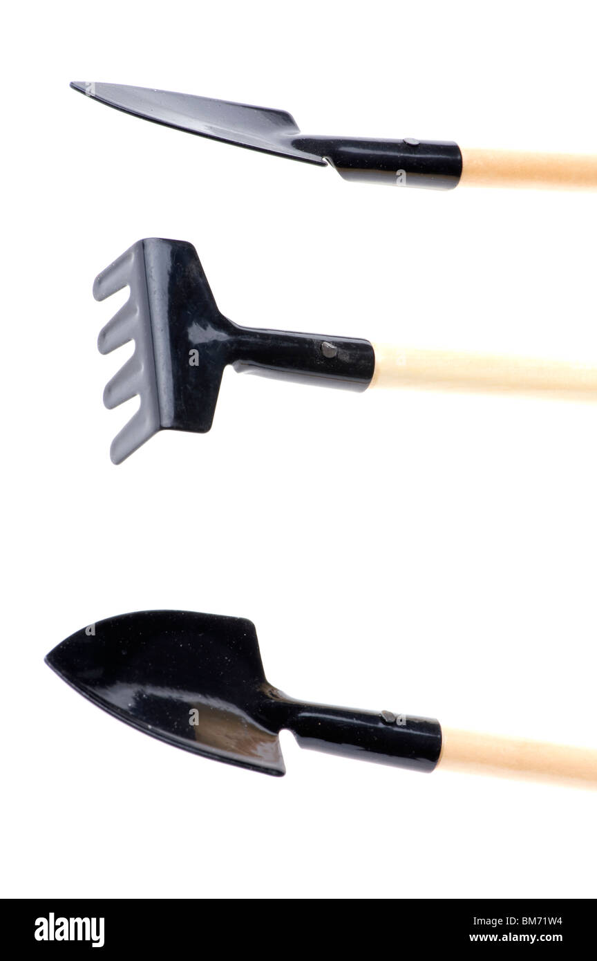 object on white - garden tool spade and rake Stock Photo - Alamy