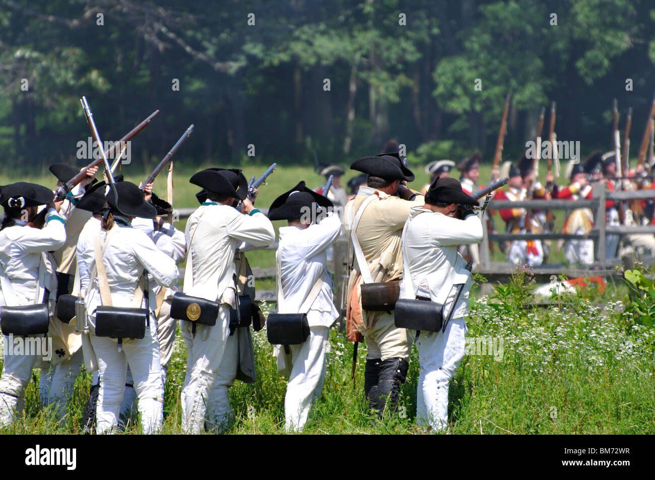 American patriots in battle - costumed American Revolutionary War era ...