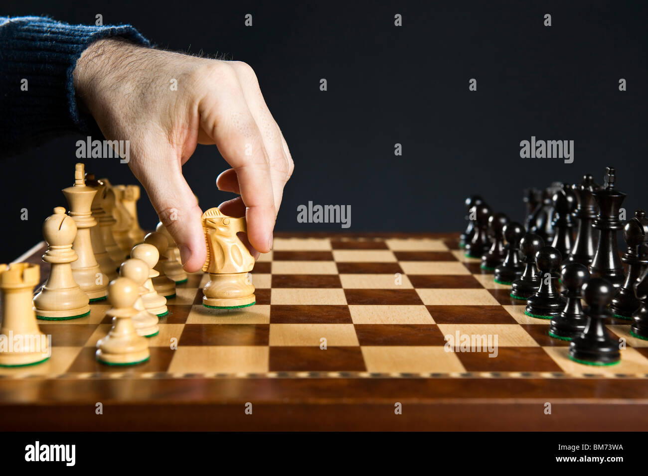 Hand holding chess piece hi-res stock photography and images - Alamy