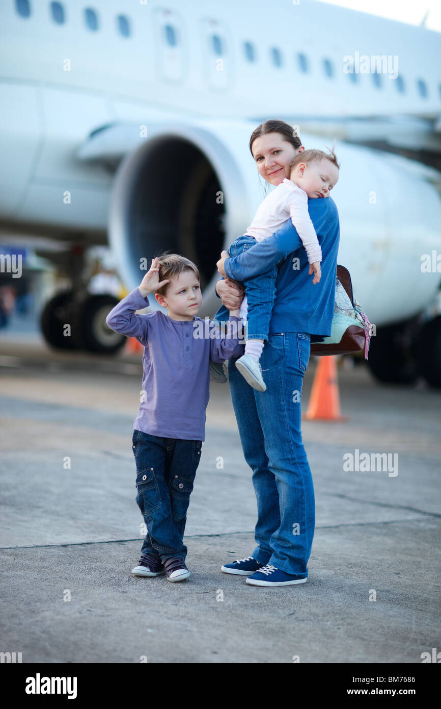 Family airplane passenger hi-res stock photography and images - Alamy