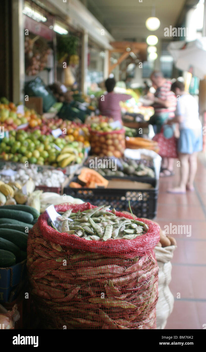 Shoppers buy fruit and vegetables in Funchal market, Madeira Stock ...