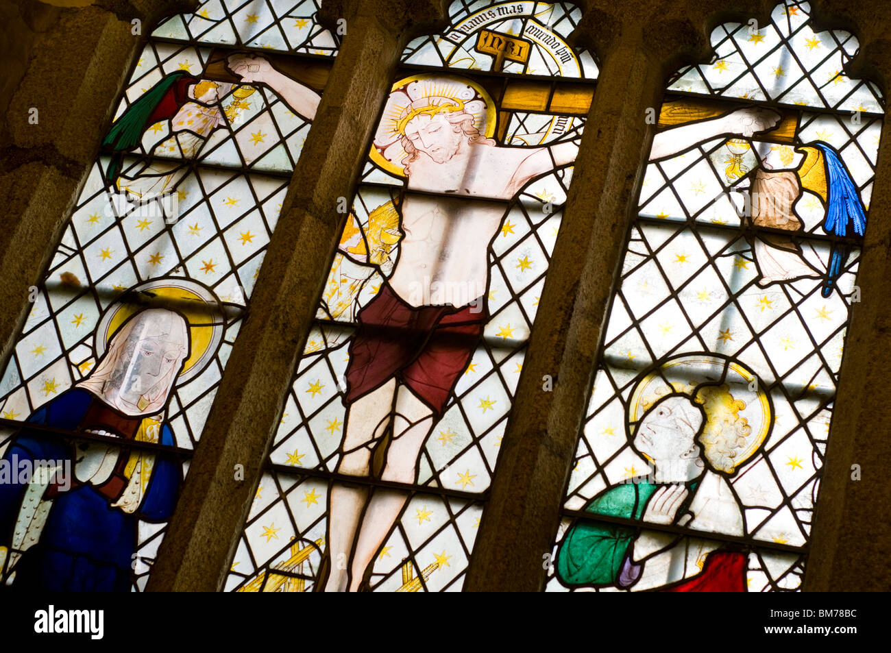A stained glass window in the chapel at Cotehele Tudor manor house near ...