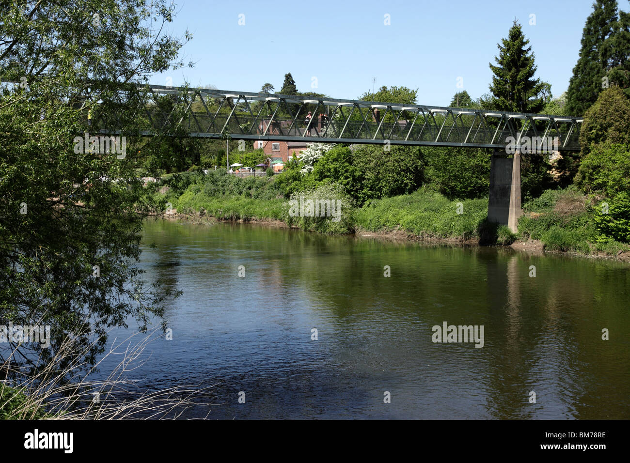 View of the pedestrian footbridge over the river severn with the ...