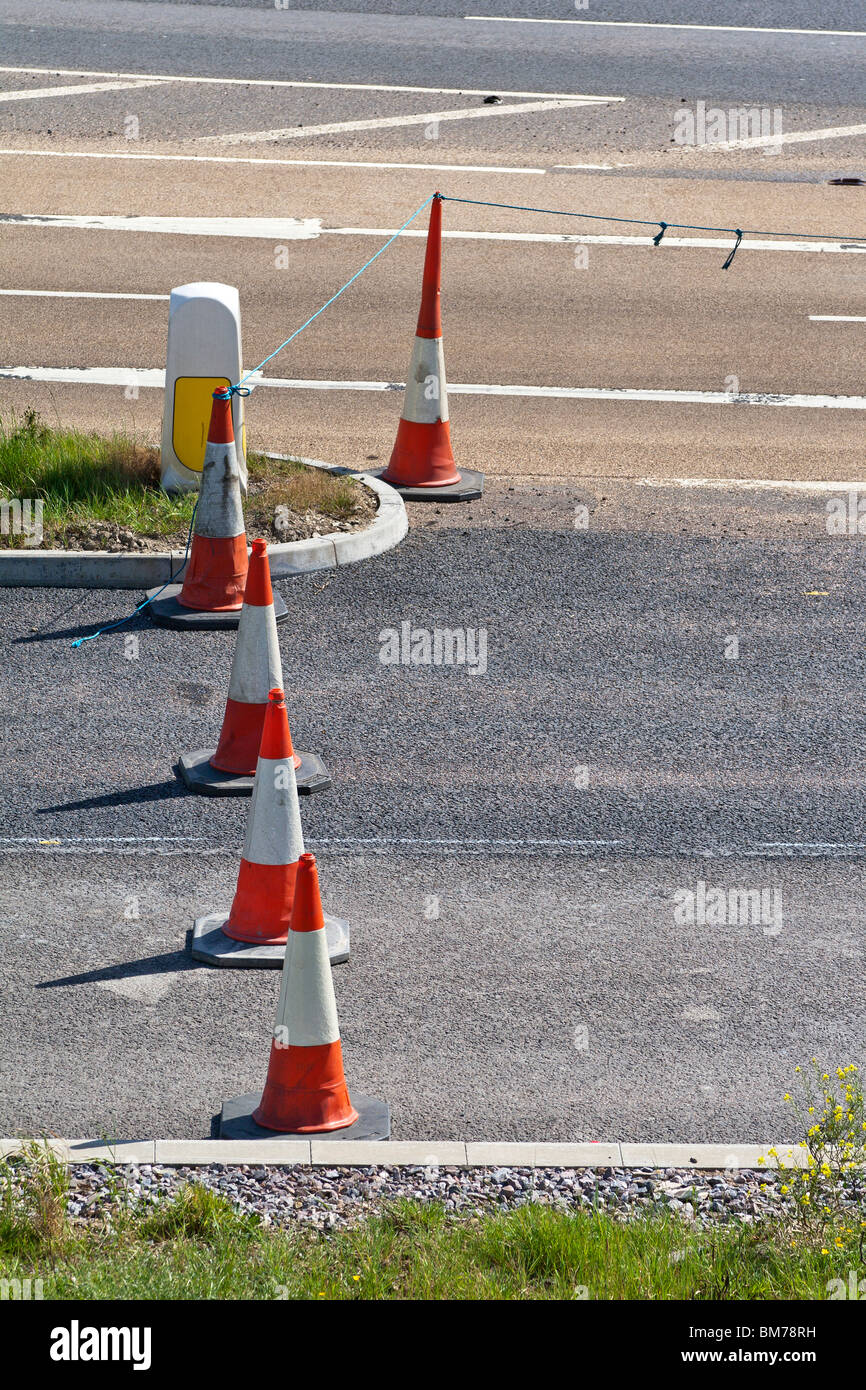 traffic cones block road access Stock Photo - Alamy