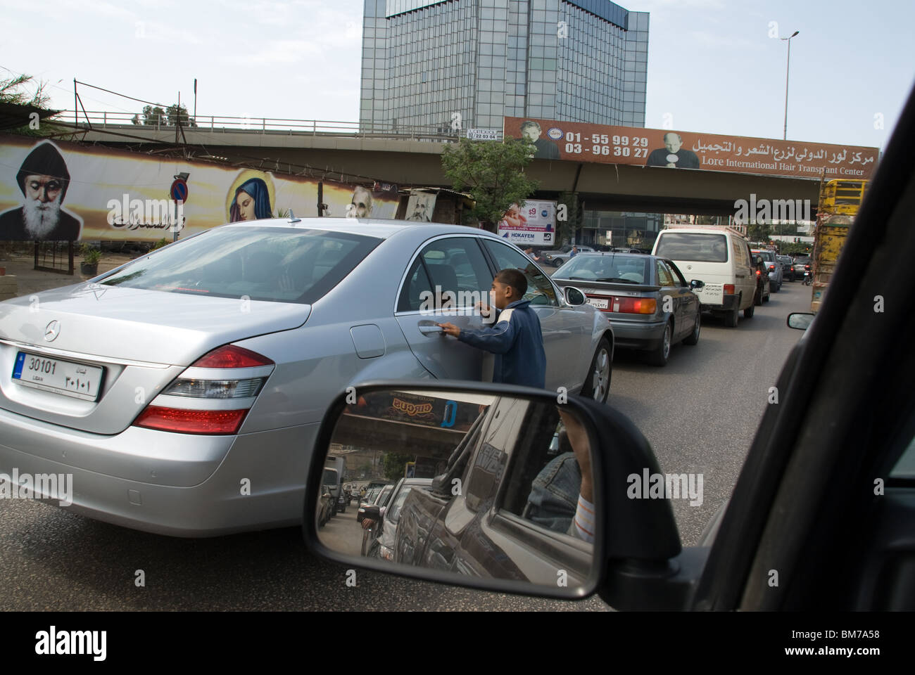 boy Bigging in the street of Beirut Lebanon Stock Photo - Alamy