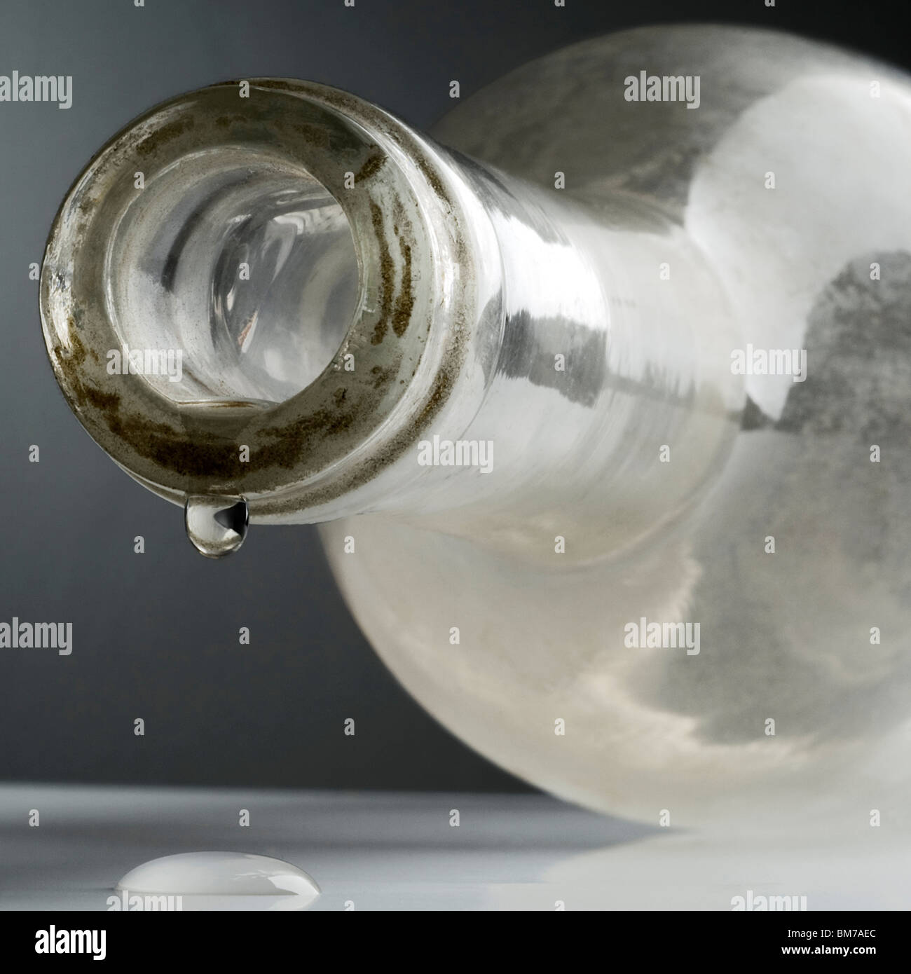 last drop oozing out of a bottle Stock Photo - Alamy