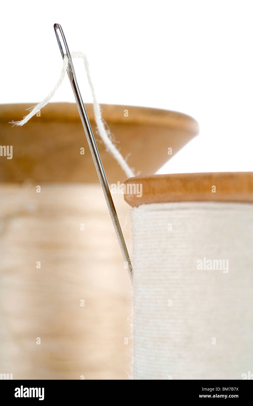 White spool of thread hi-res stock photography and images - Alamy
