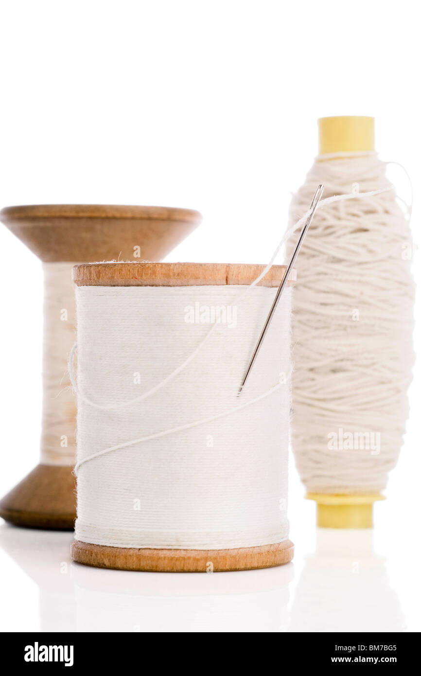 White spool of thread hi-res stock photography and images - Alamy