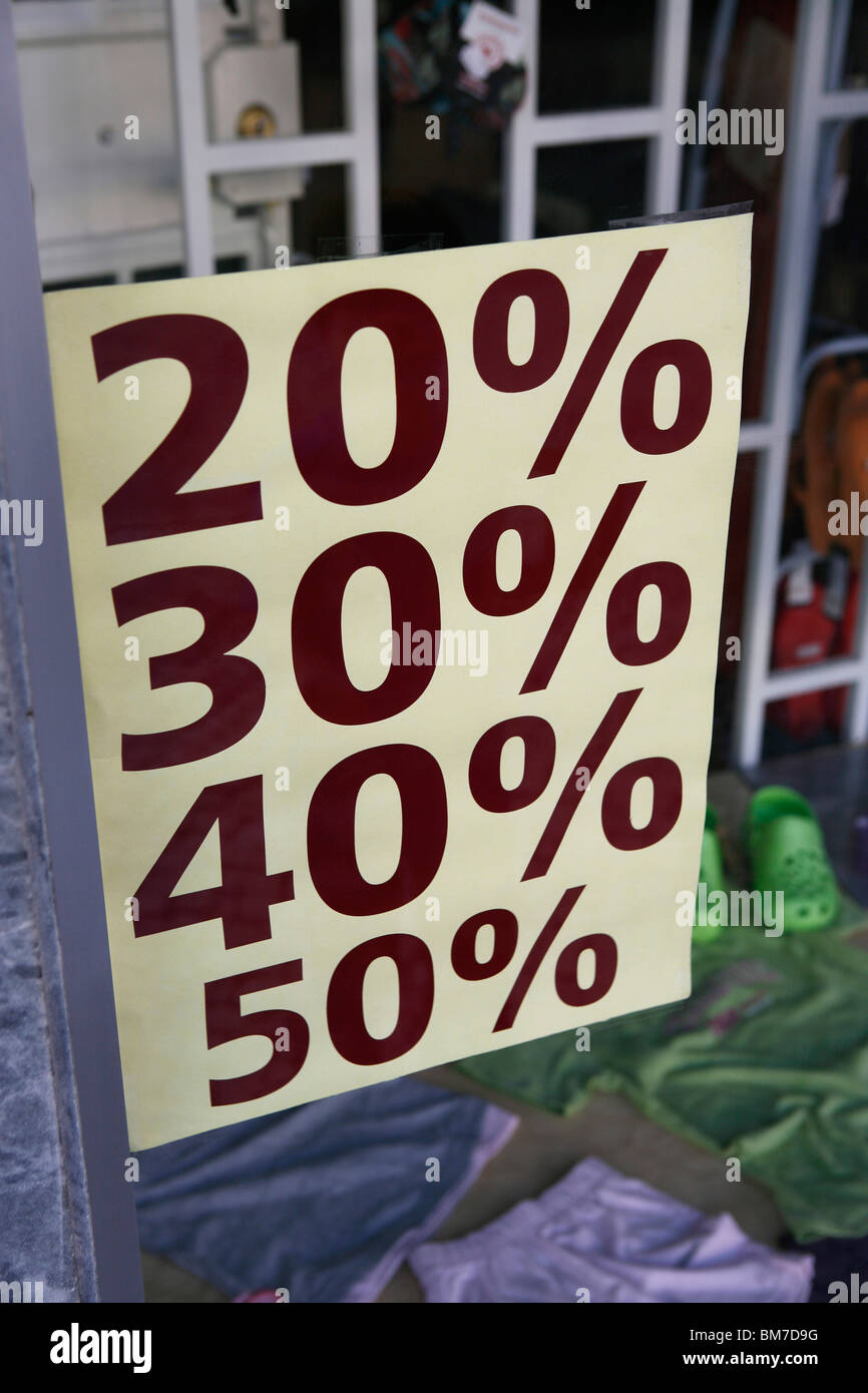 Sale sign in a store window Stock Photo - Alamy