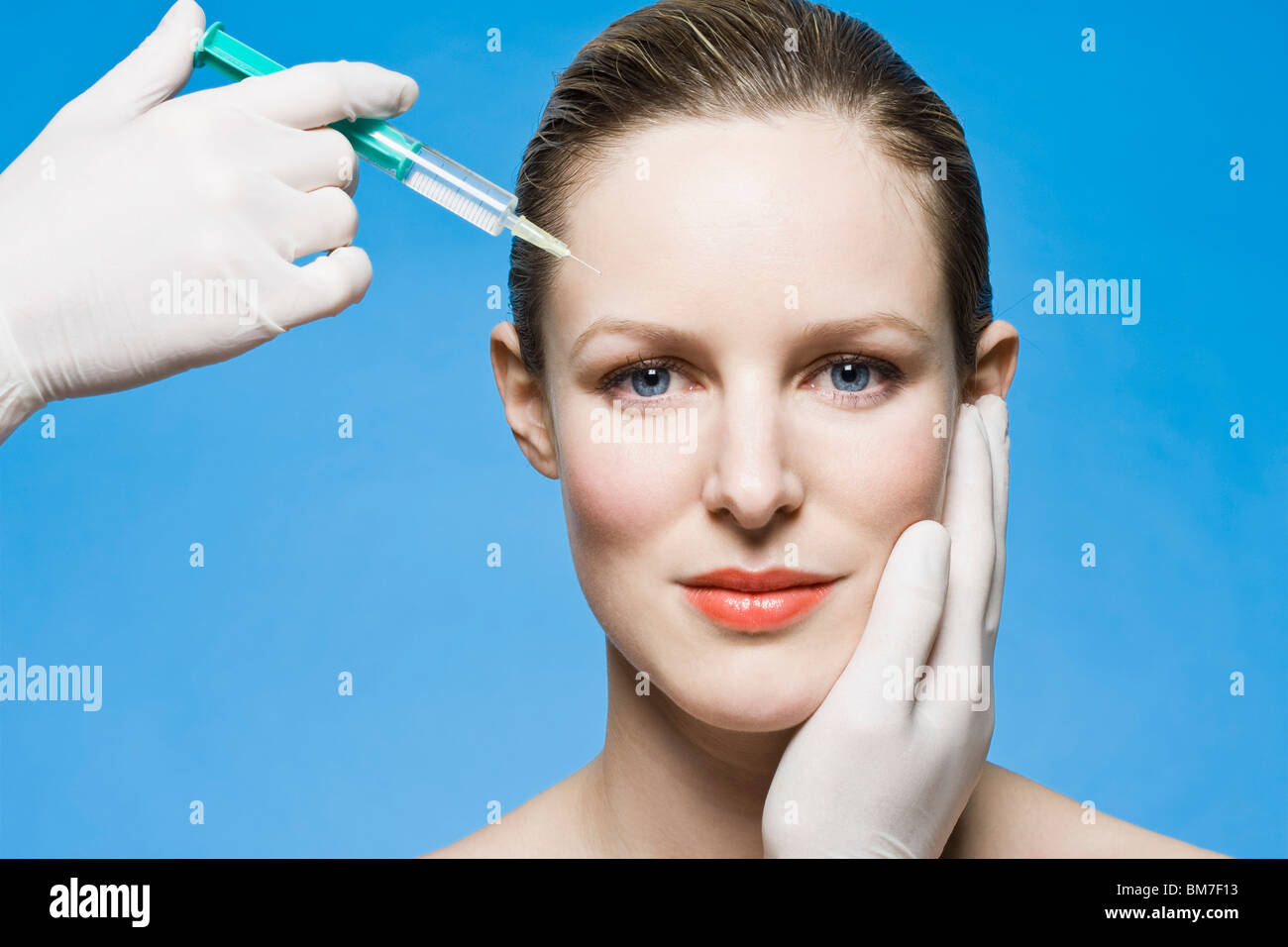 A woman receiving a Botox injection Stock Photo - Alamy