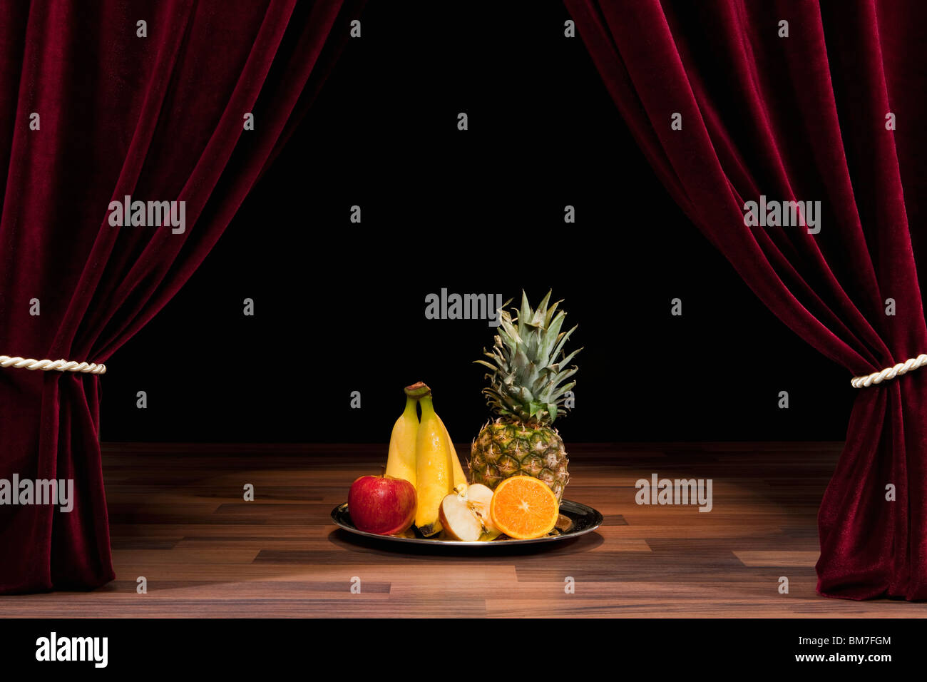 A Plate Of Fruit On A Theatre Stage Stock Photo - Alamy