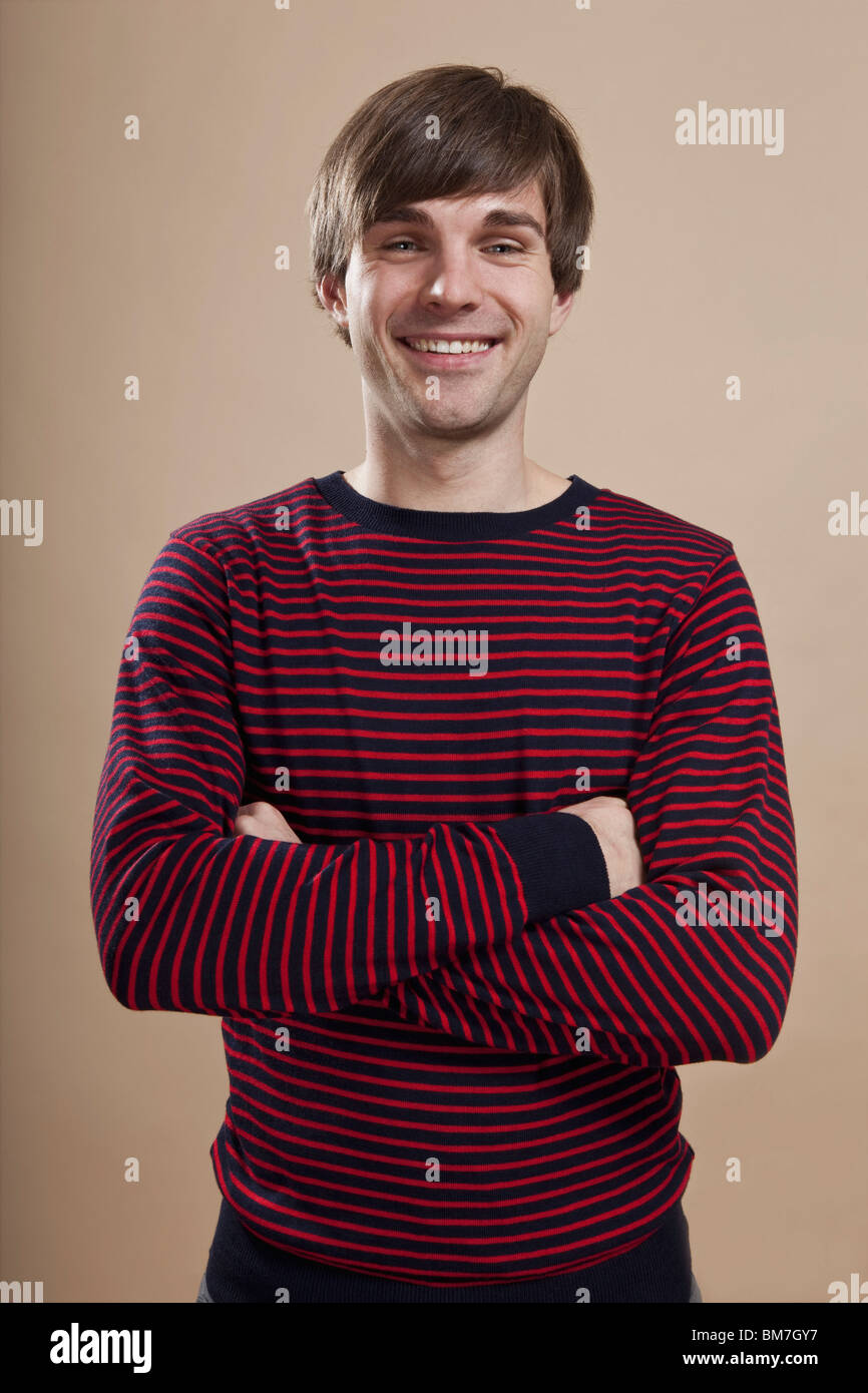 Portrait of a man looking happy, studio shot Stock Photo - Alamy