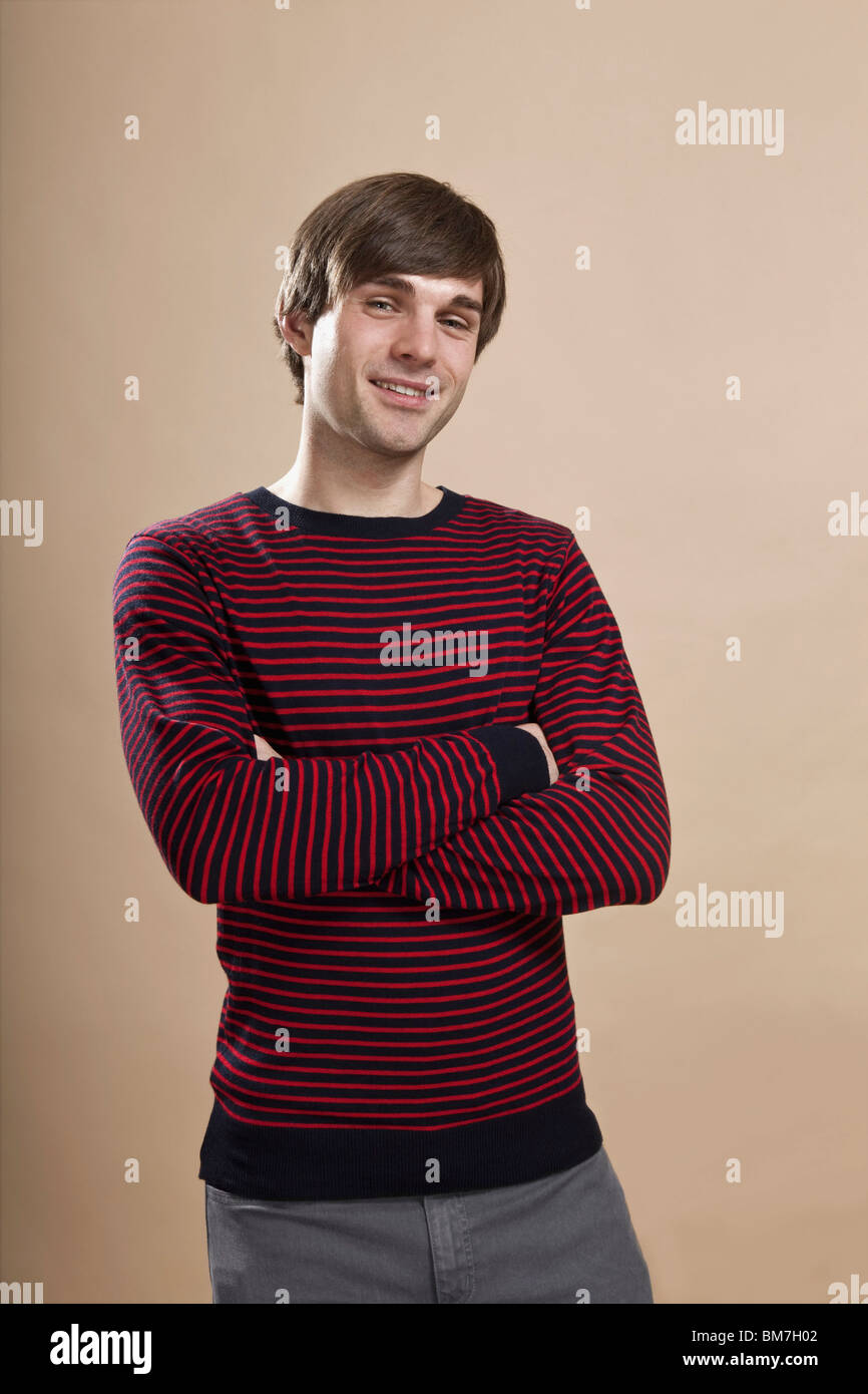 Portrait of a man looking suspicious, studio shot Stock Photo - Alamy