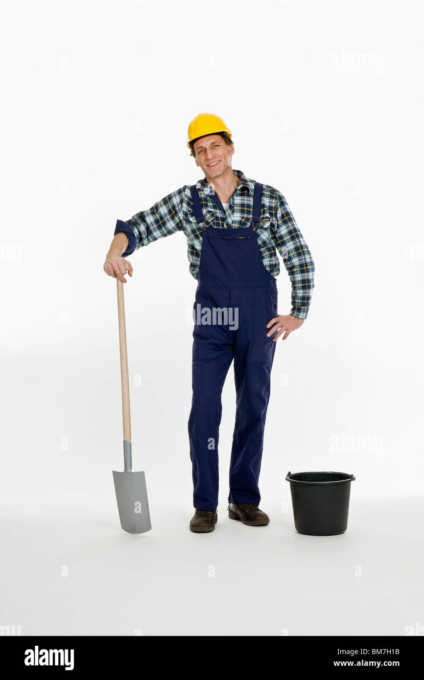 Construction worker with bucket hi-res stock photography and images - Alamy