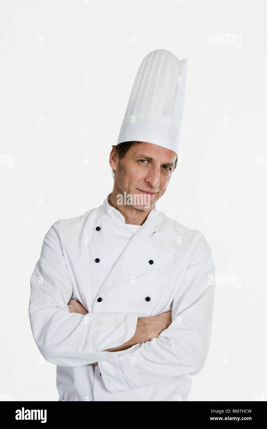 A chef with arms crossed and cocked head hi-res stock photography and ...