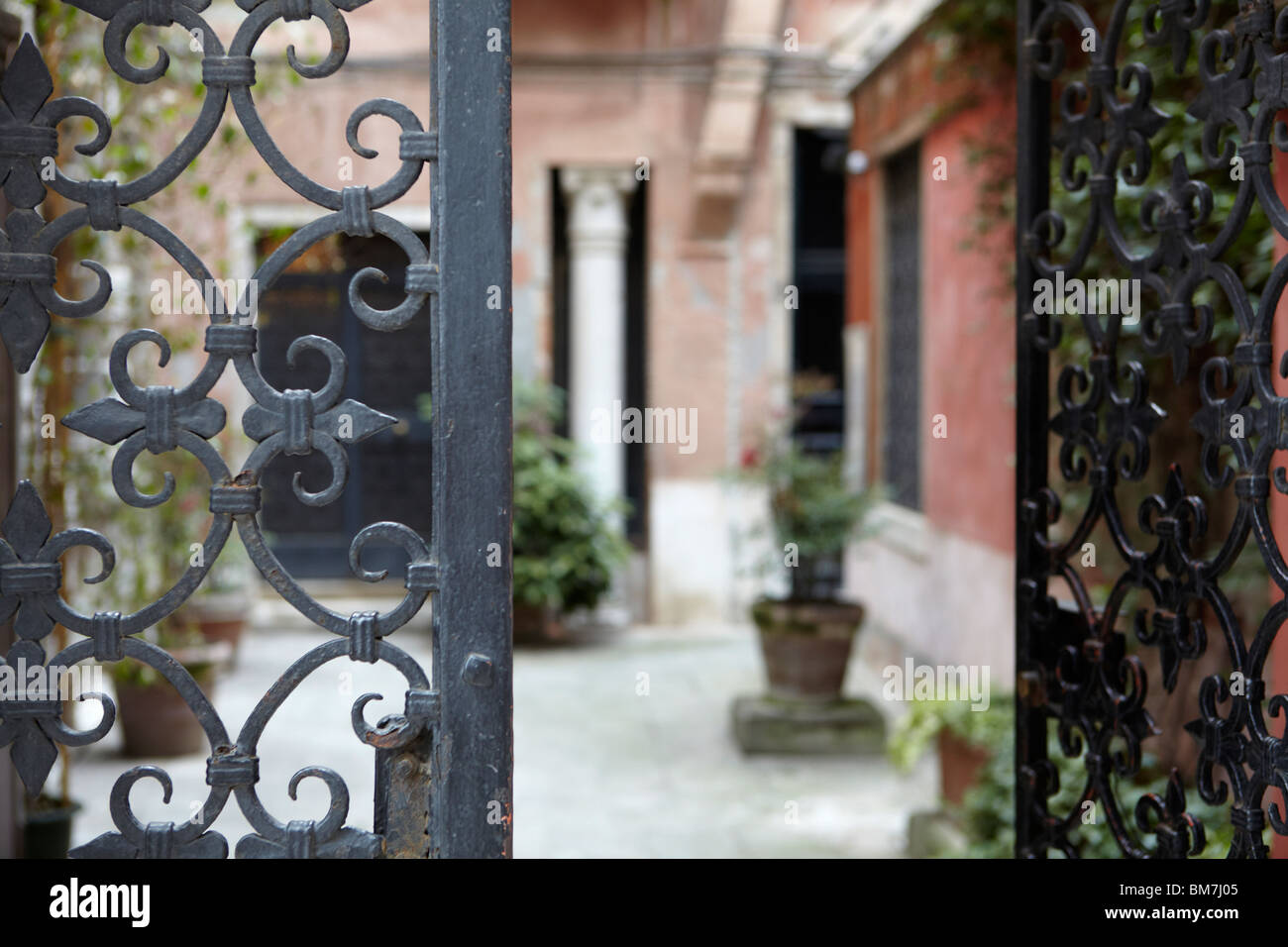 Beautiful wrought iron gateway and courtyard, Venice, Italy Stock Photo ...