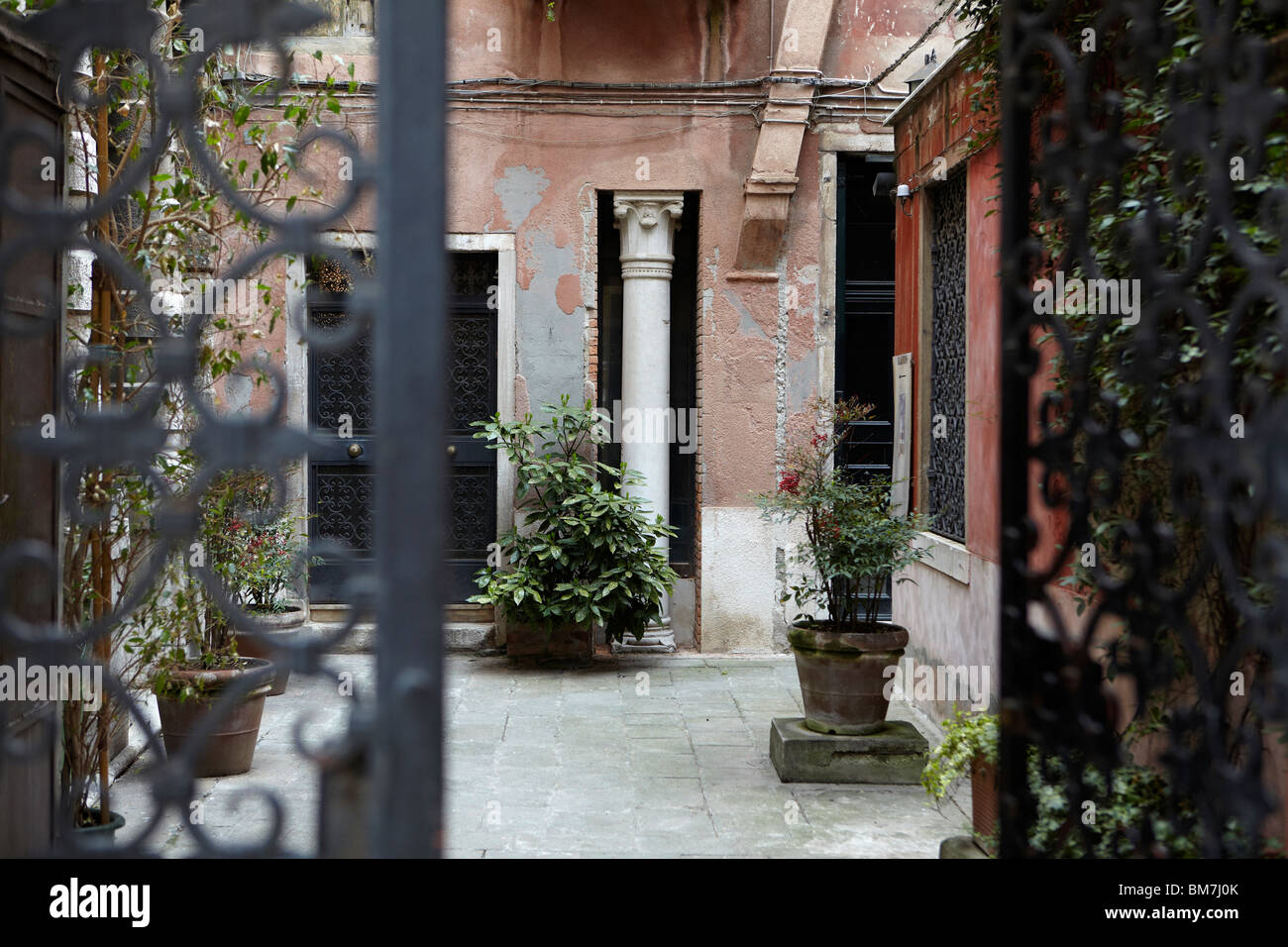 Beautiful wrought iron gateway and courtyard, Venice, Italy Stock Photo ...