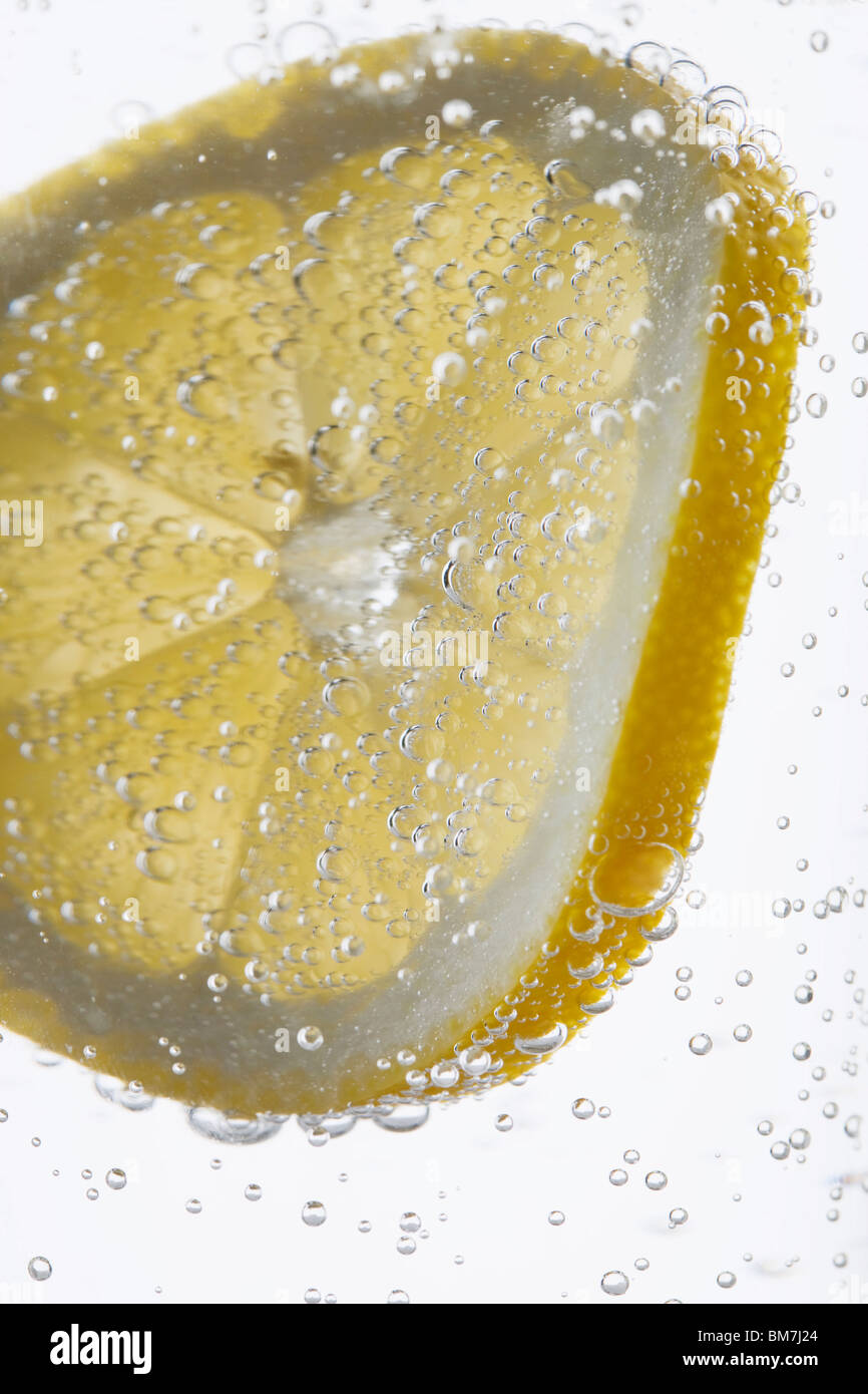 Lemon slice vertical hi-res stock photography and images - Alamy