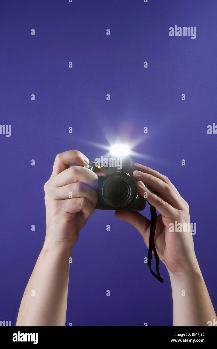 Camera taking flash hi-res stock photography and images - Alamy