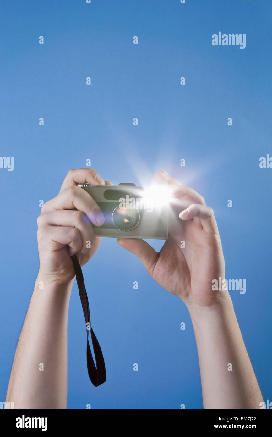 Camera taking flash hi-res stock photography and images - Alamy