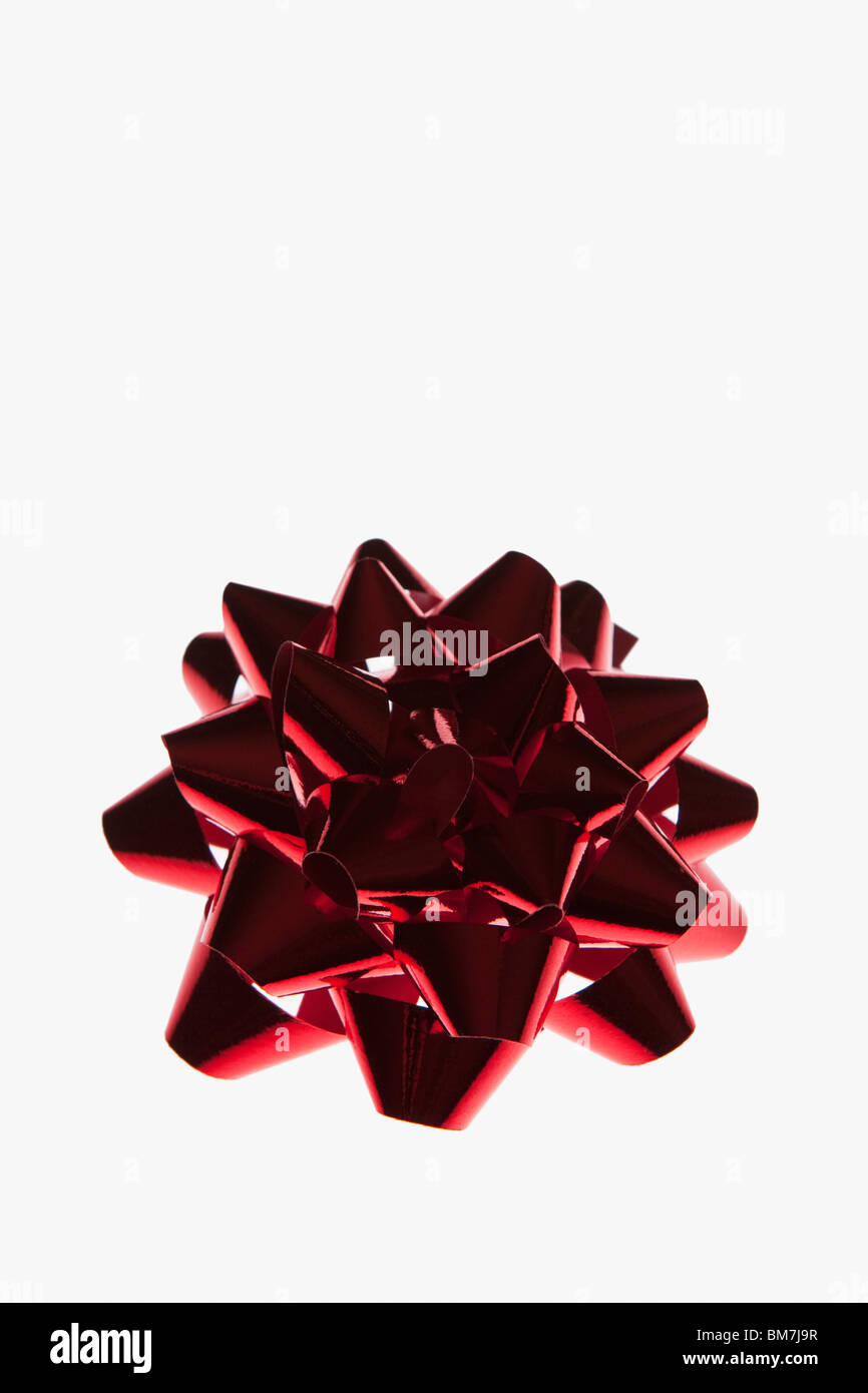 A red ribbon rosette Stock Photo - Alamy