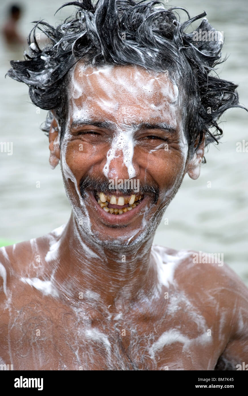 man washing at baba ghat calcutta india Stock Photo - Alamy