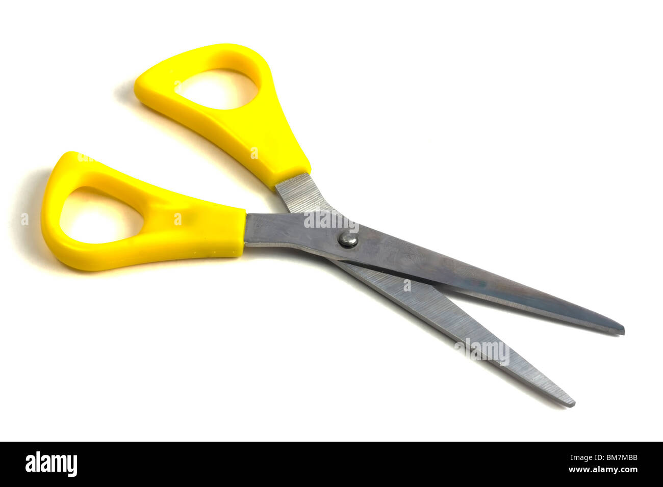 Yellow Scissors isolated on white background Stock Photo - Alamy